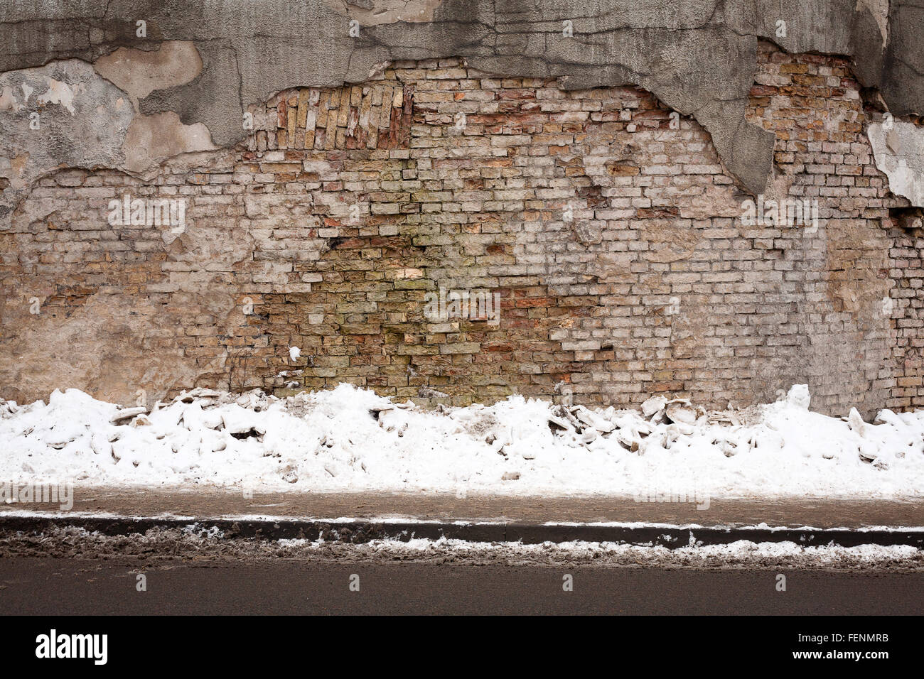 Old wall and a ground covered with snow Stock Photo - Alamy