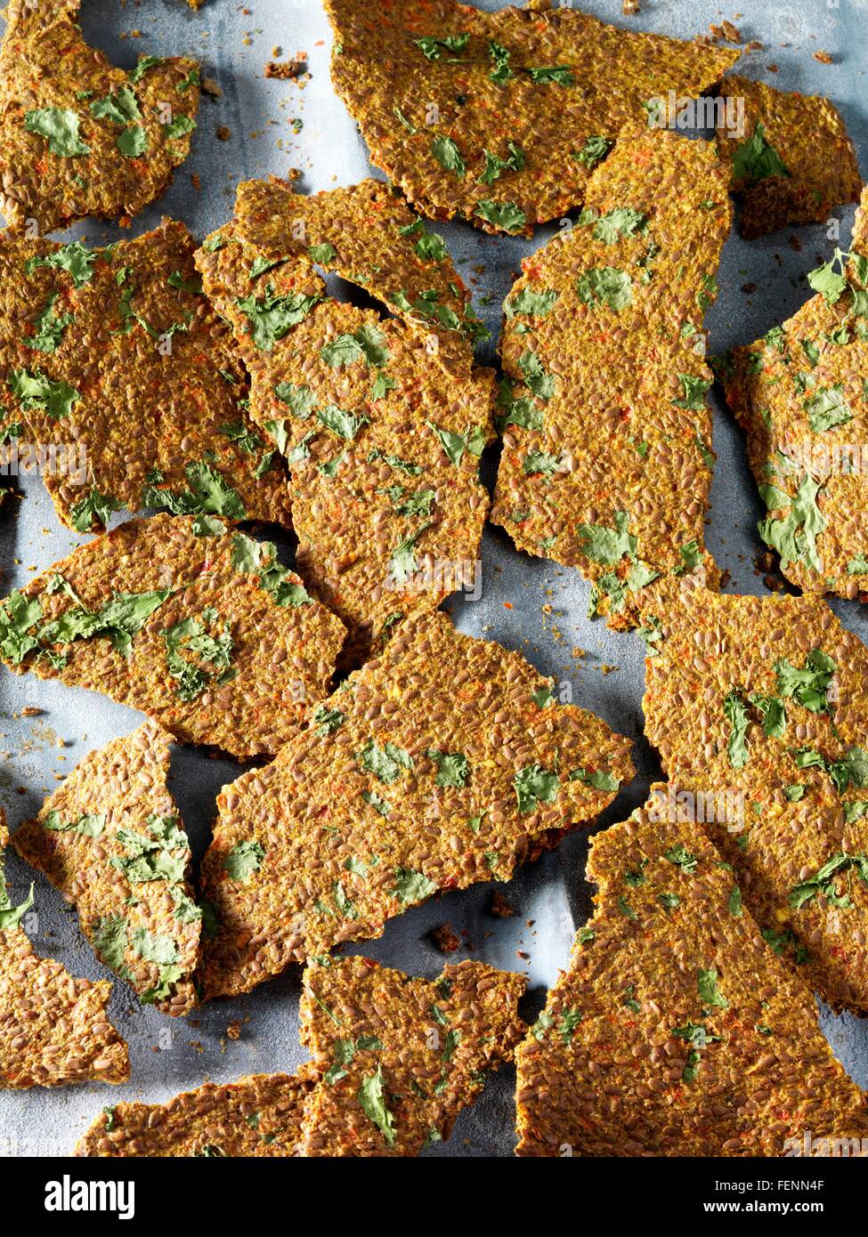 Overhead view of homemade coriander and chilli chips Stock Photo - Alamy