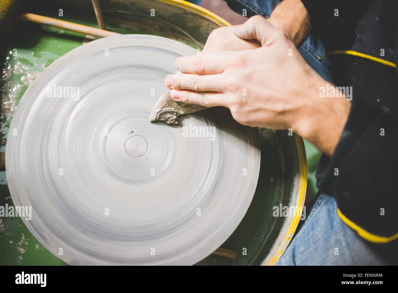 Male artist cleaning clay hi-res stock photography and images - Alamy