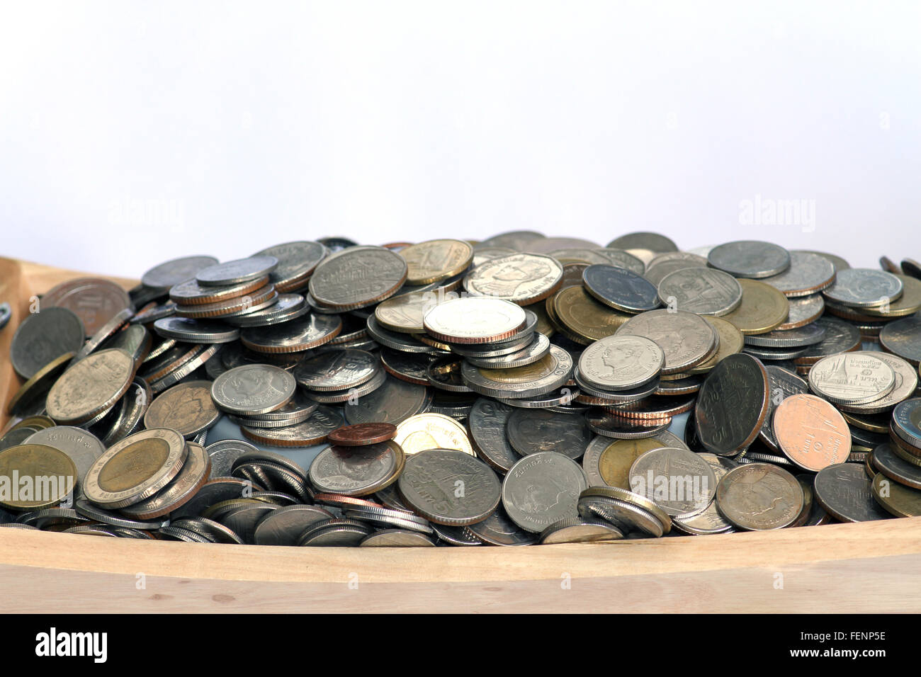 Bunch of quarters on white background Stock Photo - Alamy