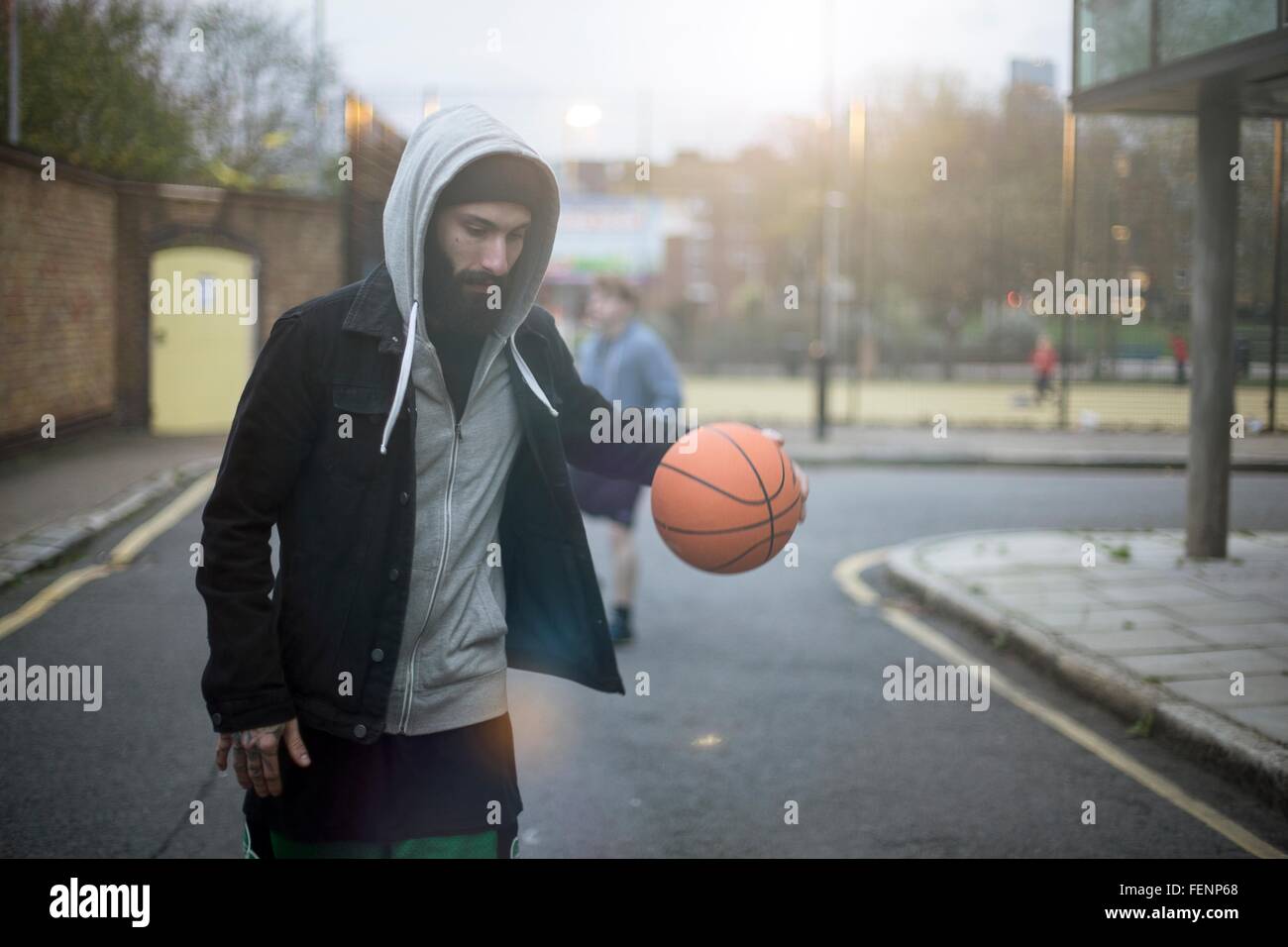 Man bouncing basketball hi-res stock photography and images - Alamy