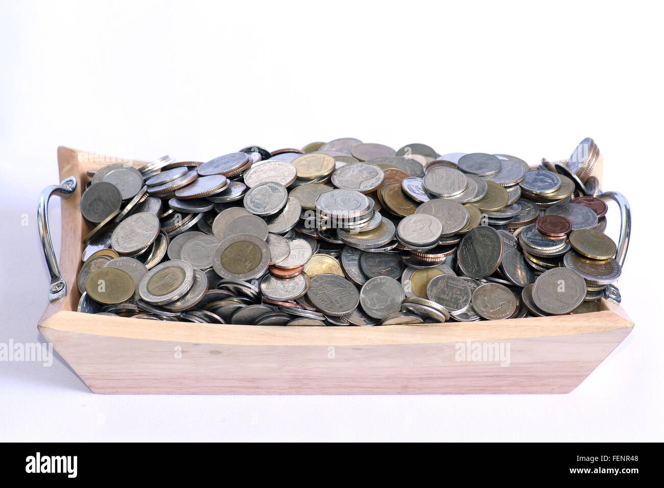 Bunch of quarters on white background Stock Photo - Alamy