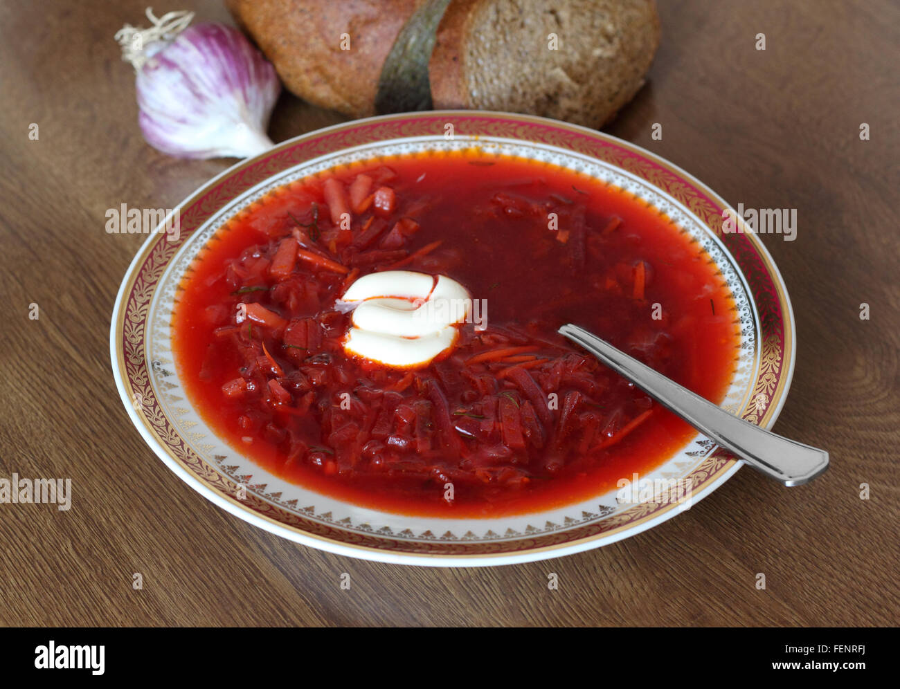 The plate of borsch on the wooden table photo Stock Photo - Alamy