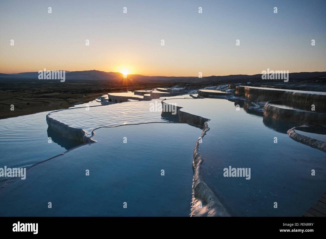 Hot spring terraces at sunset, Pamukkale, Anatolia, Turkey Stock Photo ...