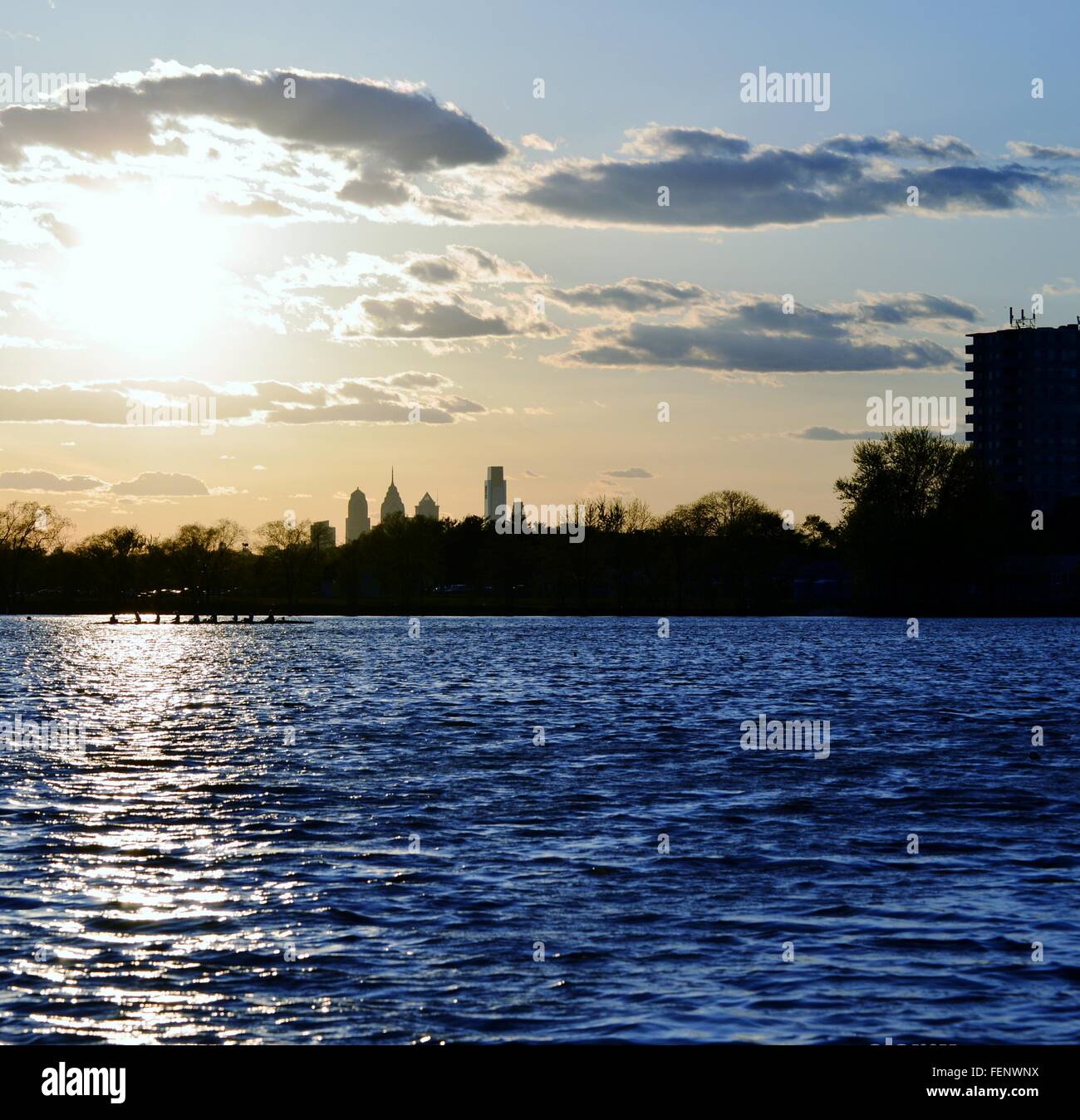 Calm River With Built Structures In Distance Stock Photo - Alamy