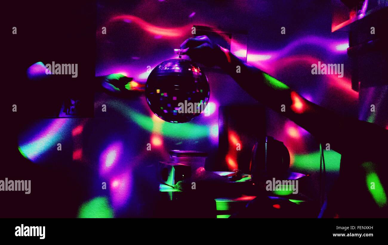 Man Holding Disco Ball Stock Photo - Alamy