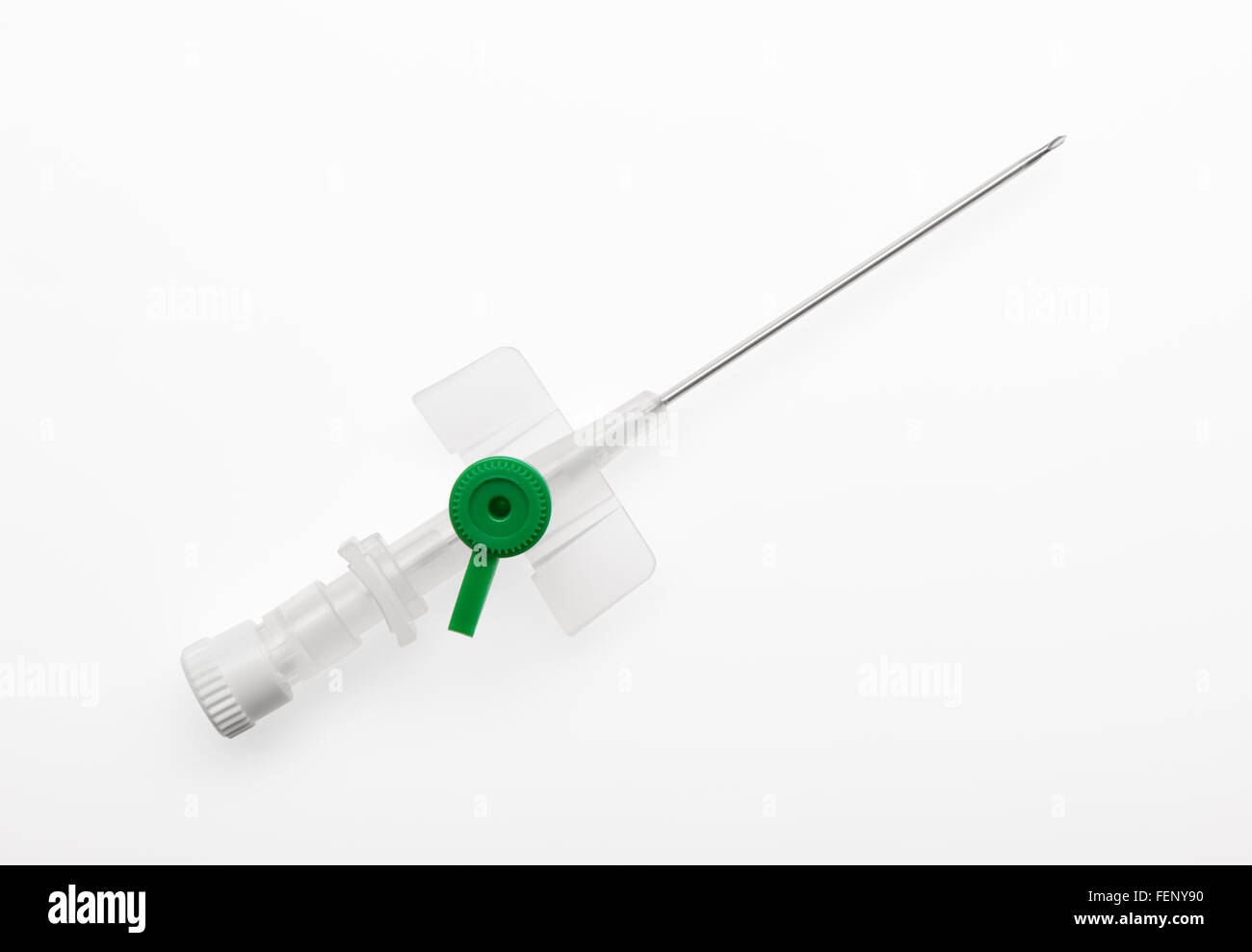 Green plastic catheter with open needle isolated on white background ...