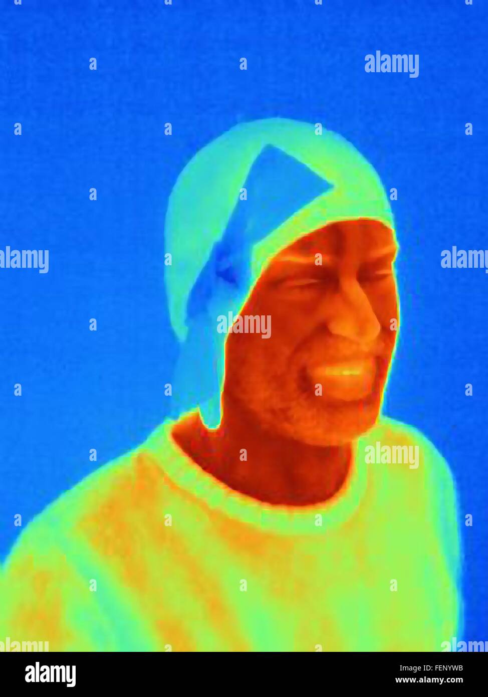 Thermal image of young man wearing face mask and cap with ribbon Stock ...