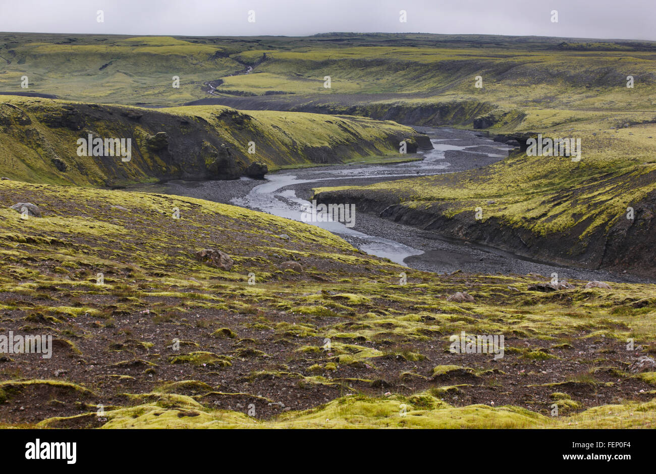 Icelandic landscape with river and volcanic rocks Stock Photo - Alamy