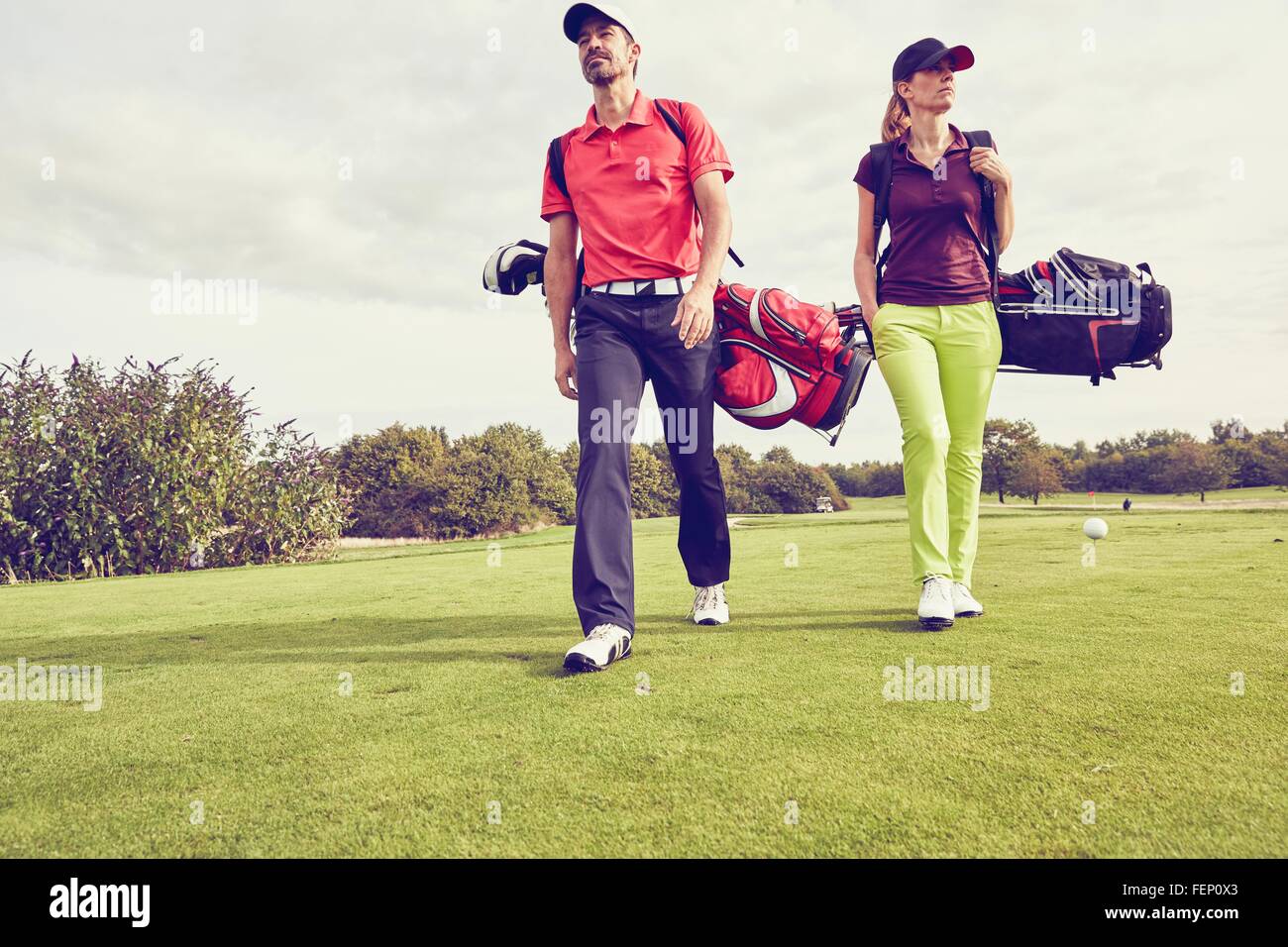 Golfers walking on course, Korschenbroich, Dusseldorf, Germany Stock ...