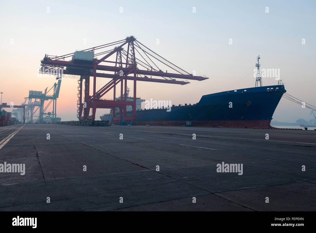 Container ship and cranes at port Stock Photo - Alamy