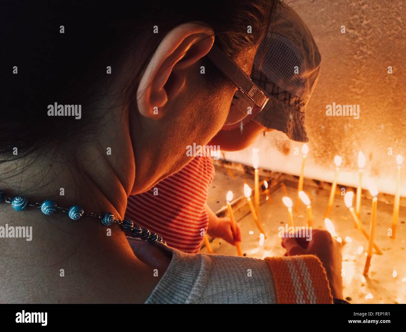 Child with candle church hi-res stock photography and images - Alamy