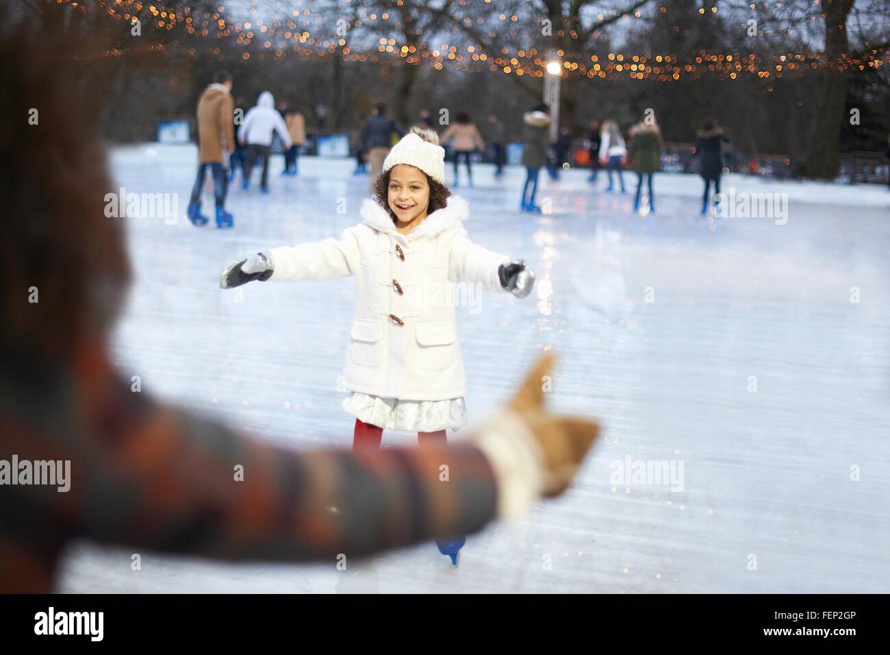 Child ice skating hi-res stock photography and images - Alamy