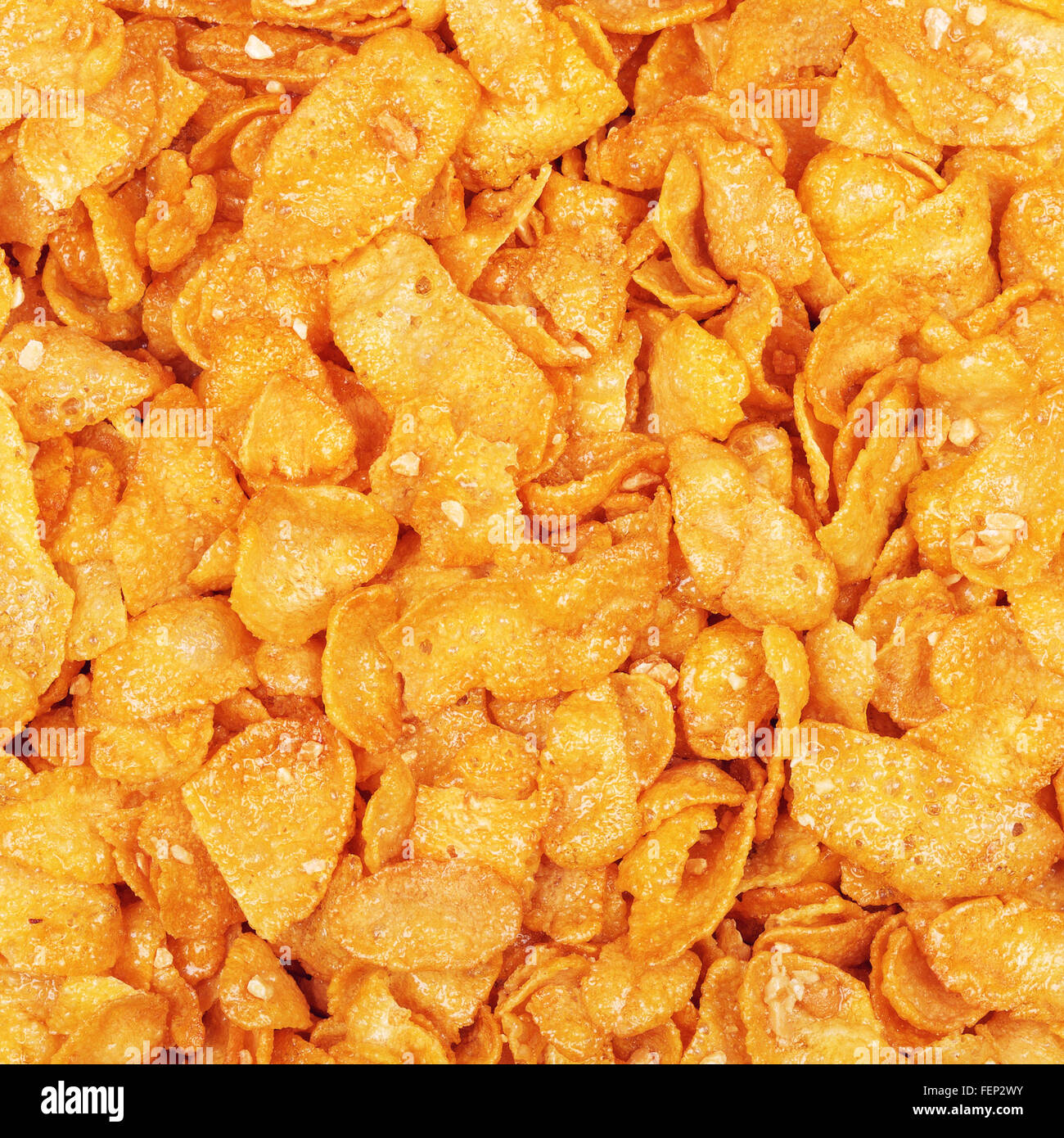 cornflakes with honey and nuts, closeup background Stock Photo - Alamy