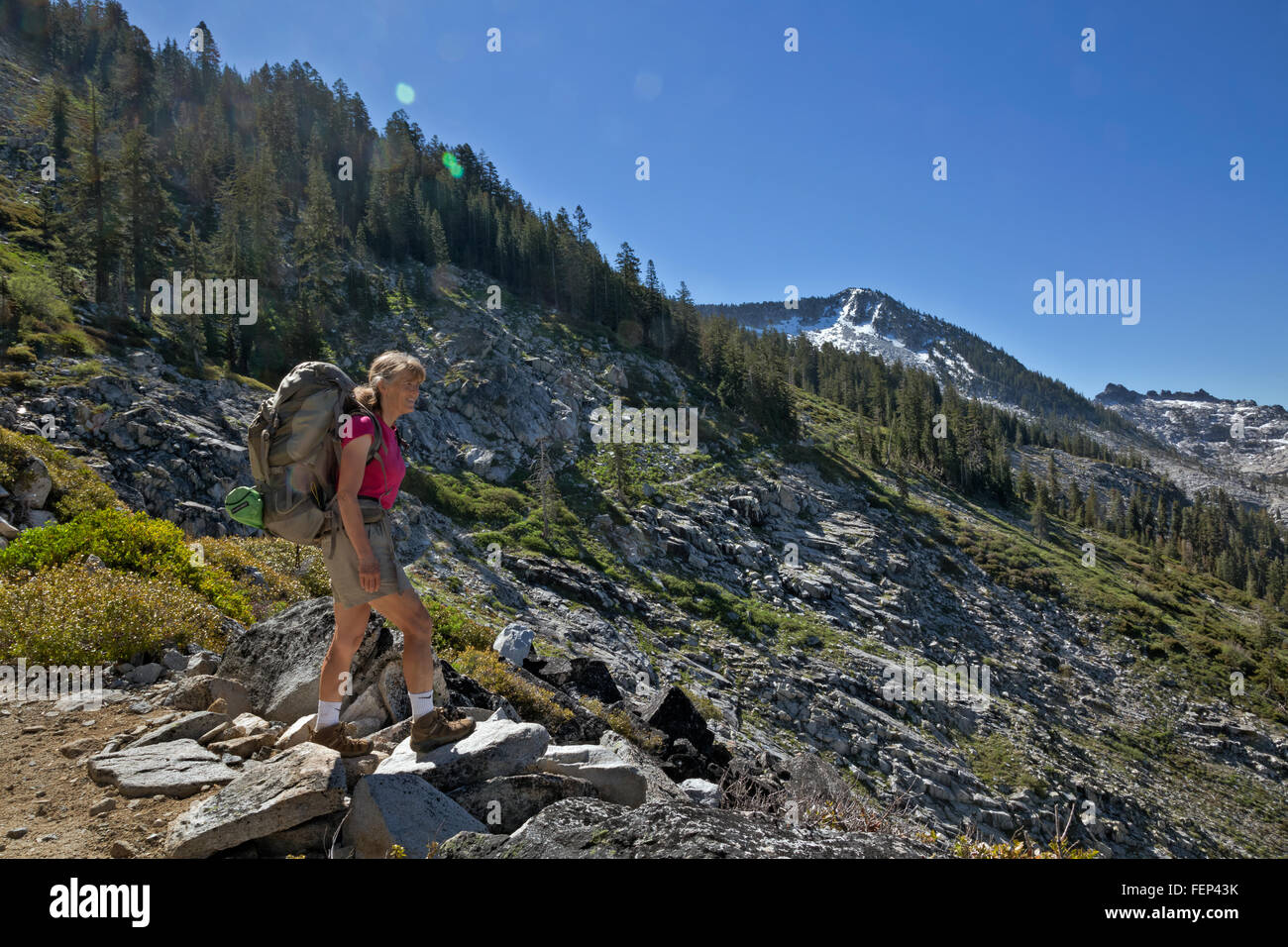 CALIFORNIA - Hiker on the Caribou Lakes Trail in the Trinity Alps ...