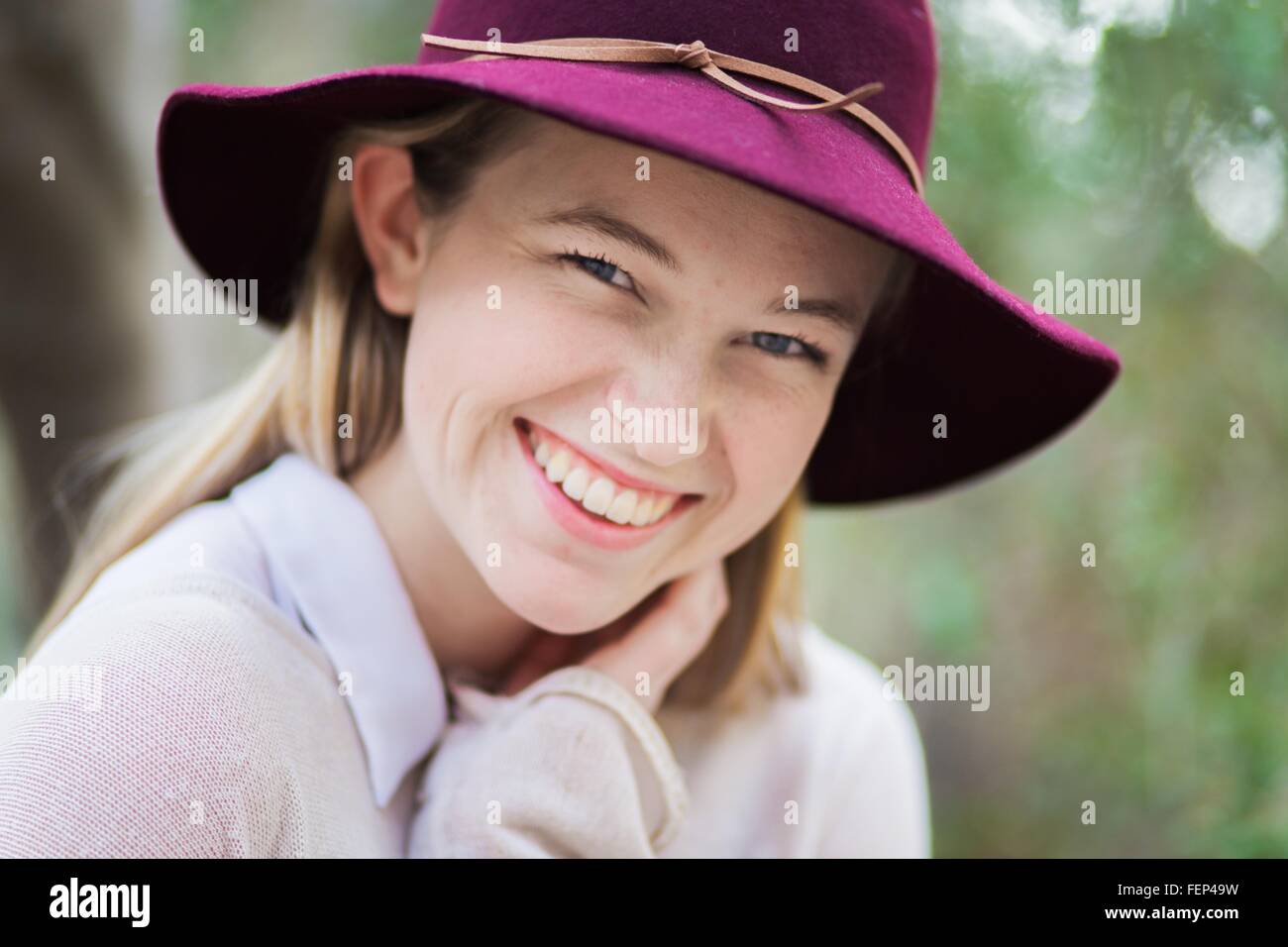 Woman smiling outdoors hi-res stock photography and images - Alamy