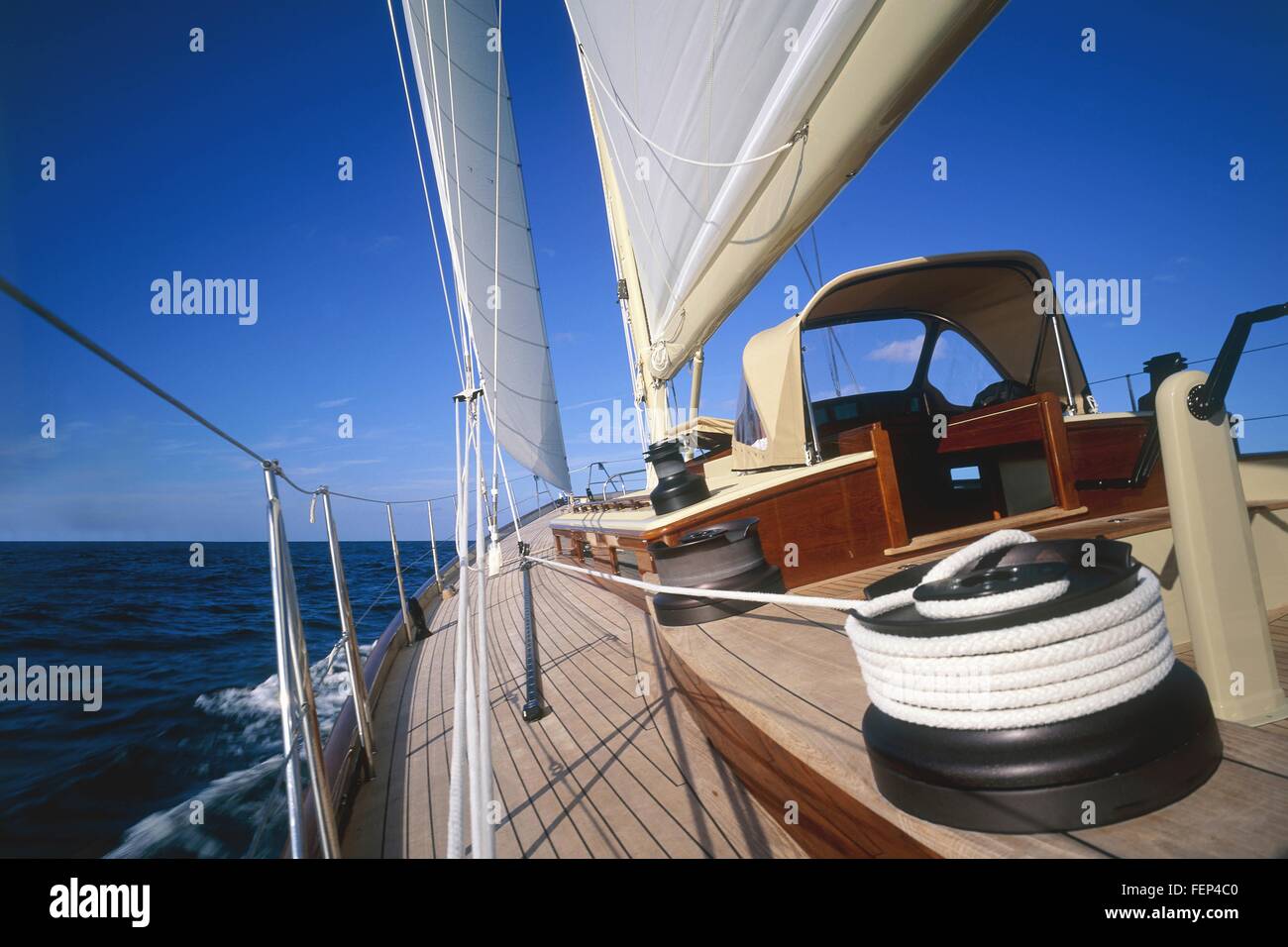 Angled view of sail winch on yacht on ocean Stock Photo - Alamy