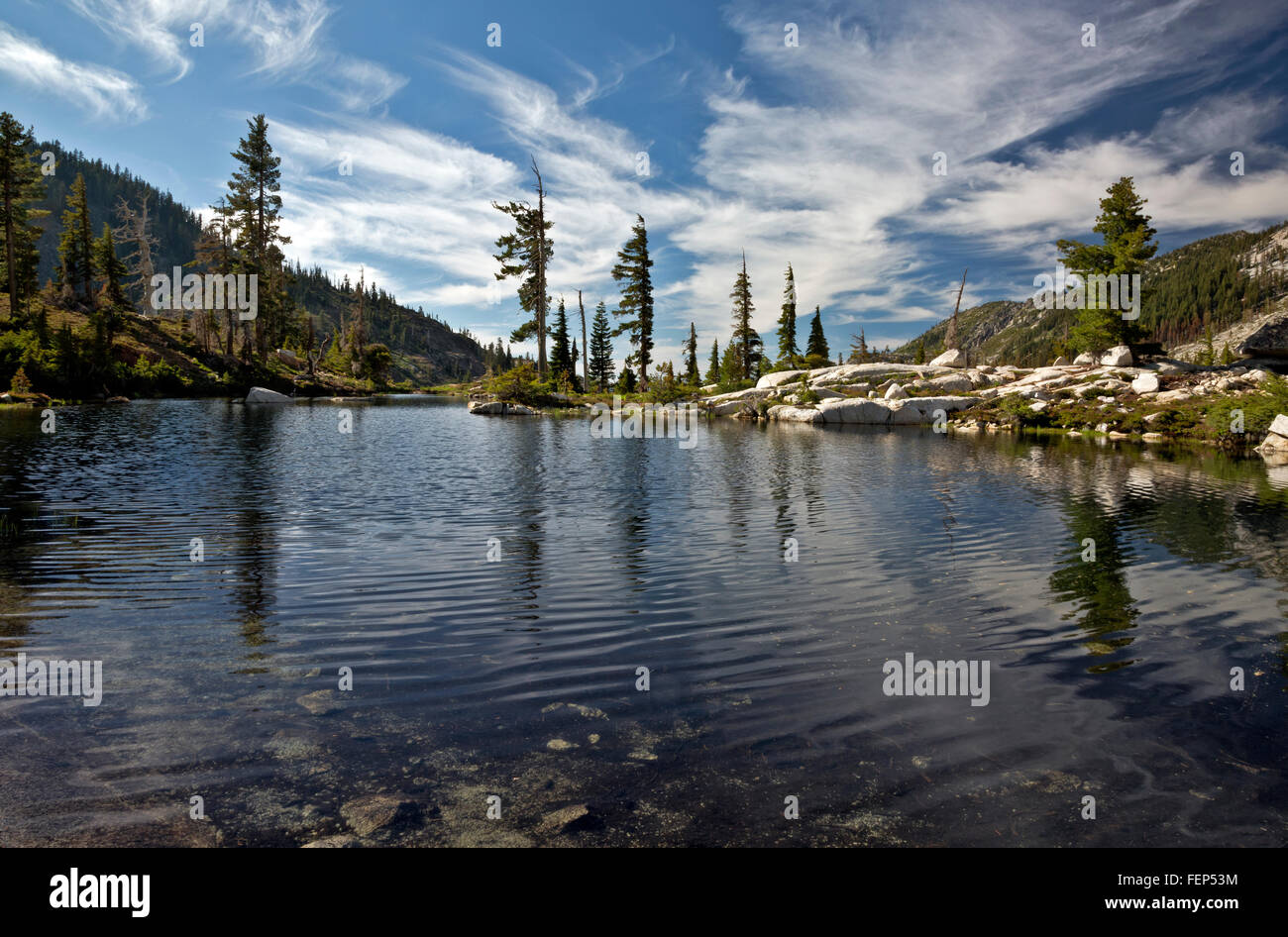 CALIFORNIA - A small tarn at upper end of Caribou Lake in Trinity Alps ...