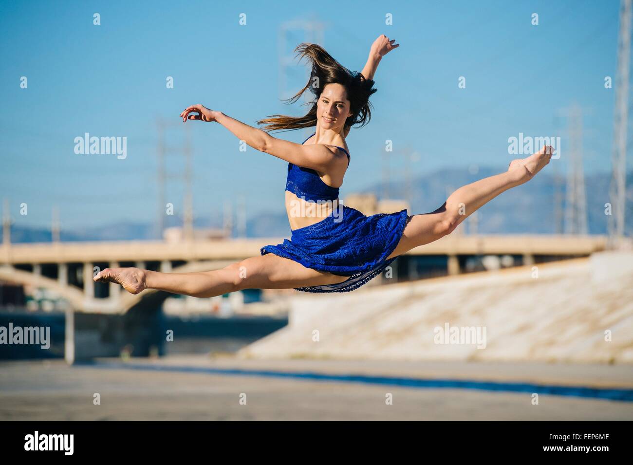 Young woman dancing camera outdoors hi-res stock photography and images ...