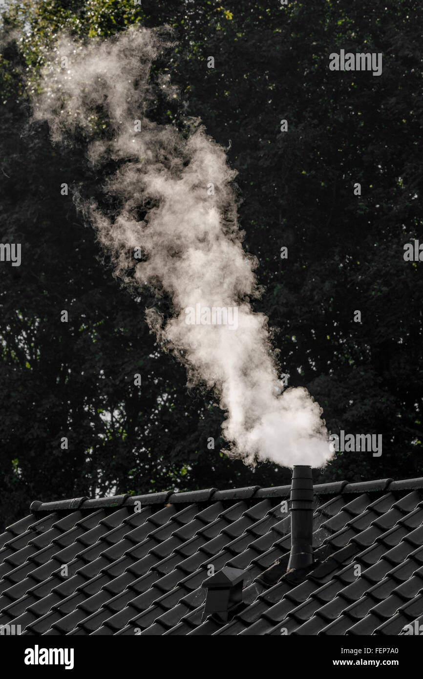 Smoke coming out of roof structure hi-res stock photography and images ...