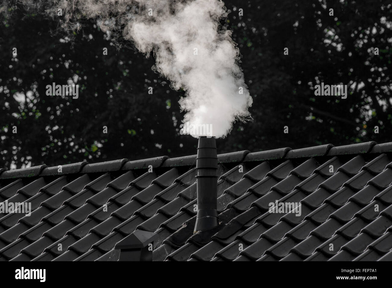Smoke from pipe on roof hi-res stock photography and images - Alamy