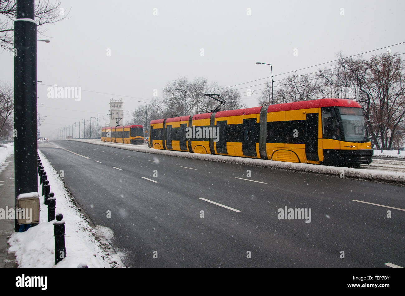 Two yellow trams Stock Photo - Alamy