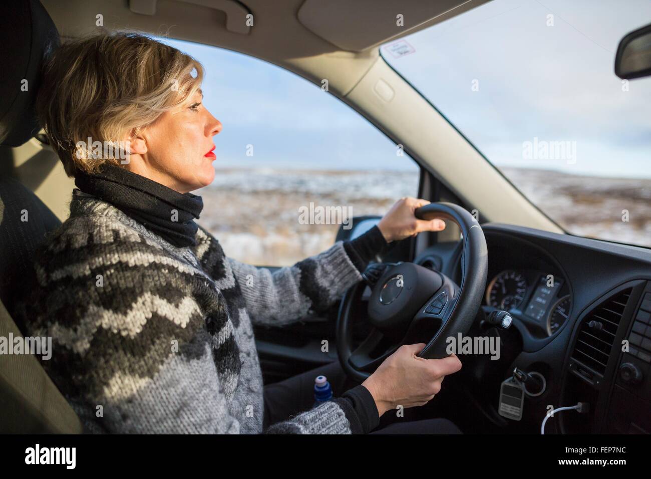 Mature woman driving car hi-res stock photography and images - Alamy