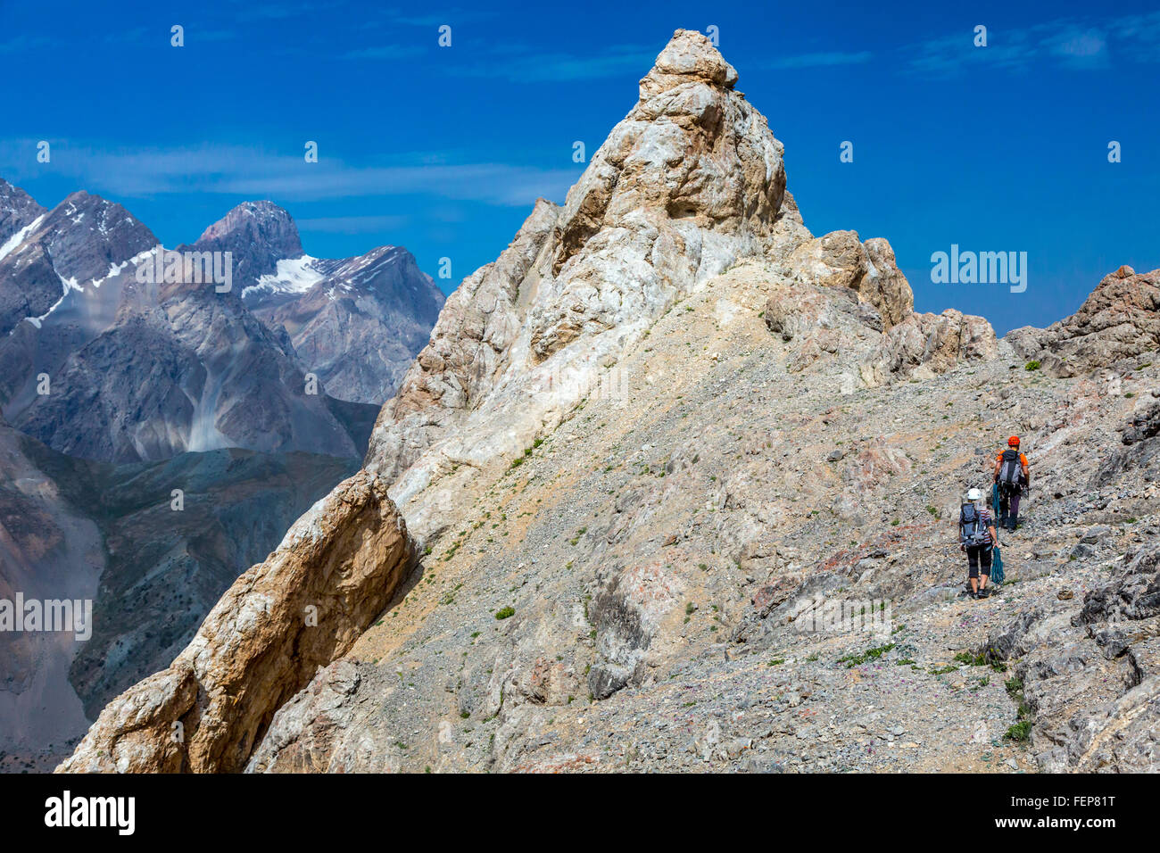 Razor sharp summit and climbers Stock Photo - Alamy