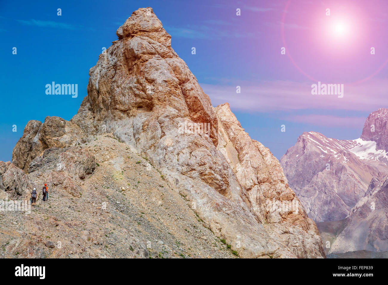 Razor sharp summit and climbers Stock Photo - Alamy