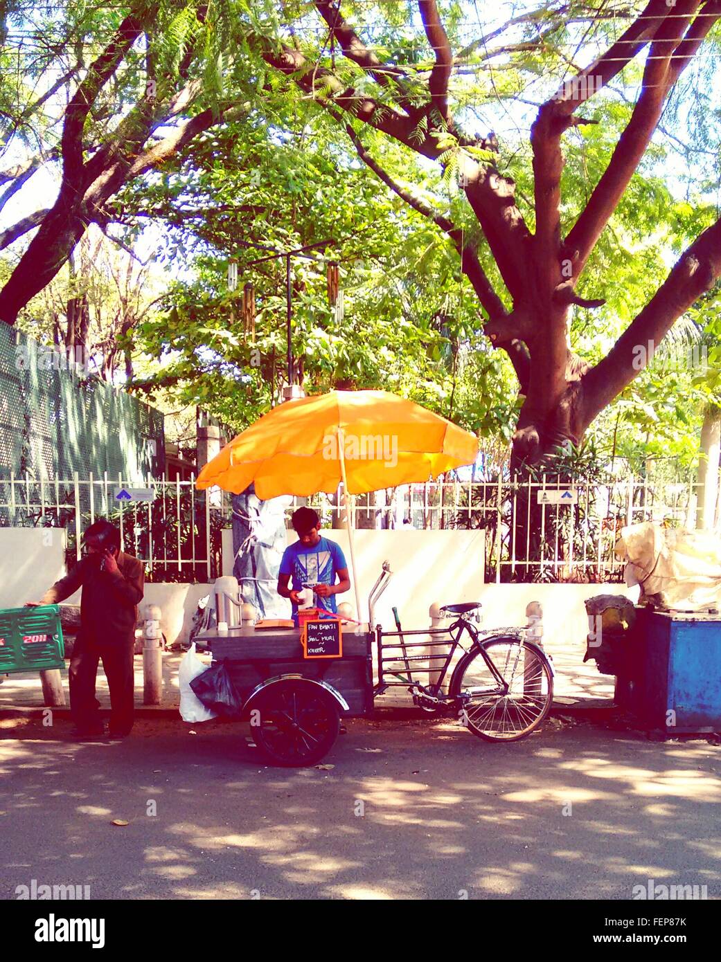 Vendor on tricycle hi-res stock photography and images - Alamy