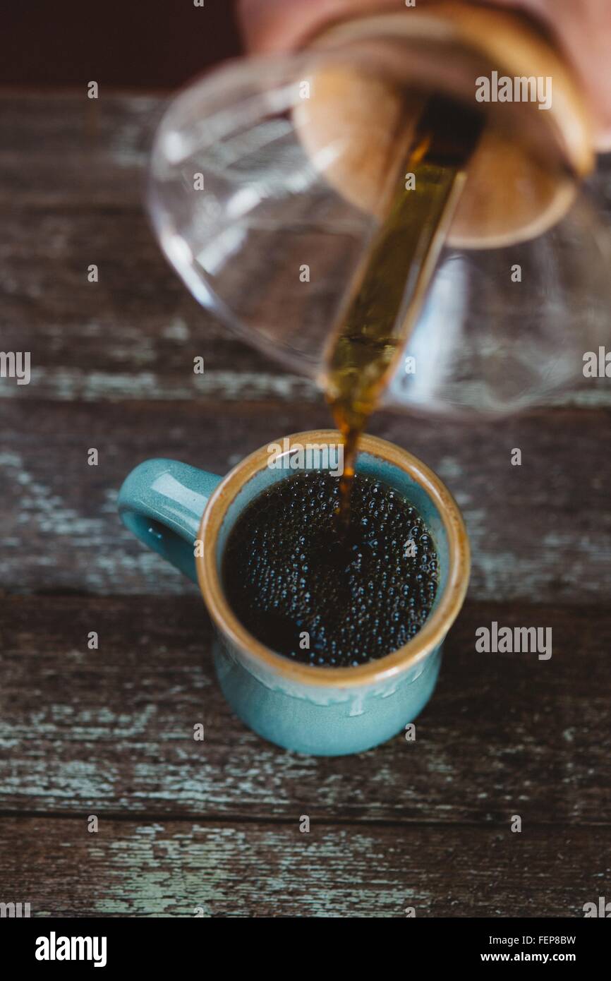 Close up fresh coffee pouring hi-res stock photography and images - Alamy