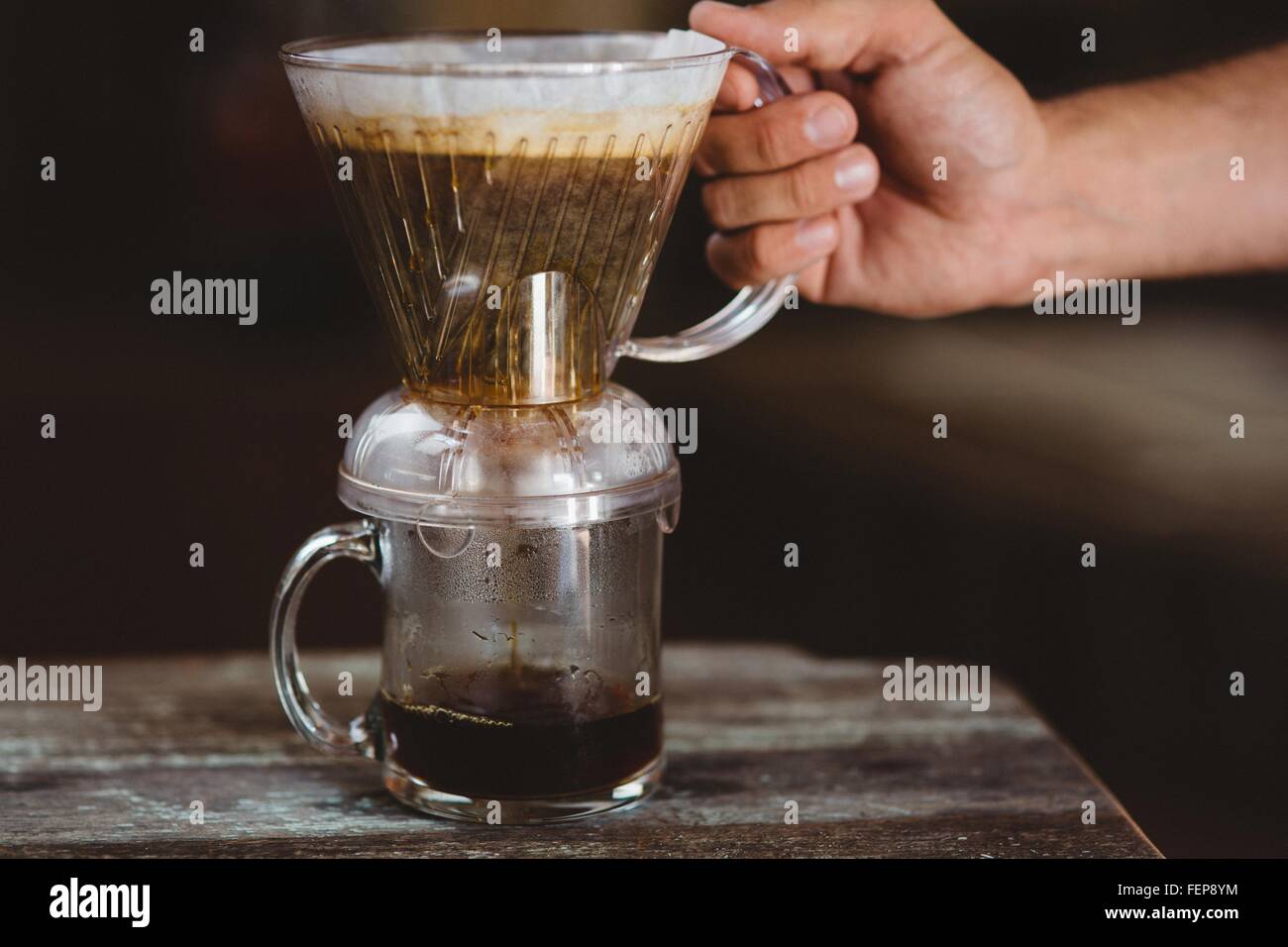 Man holding filter coffee maker Stock Photo - Alamy