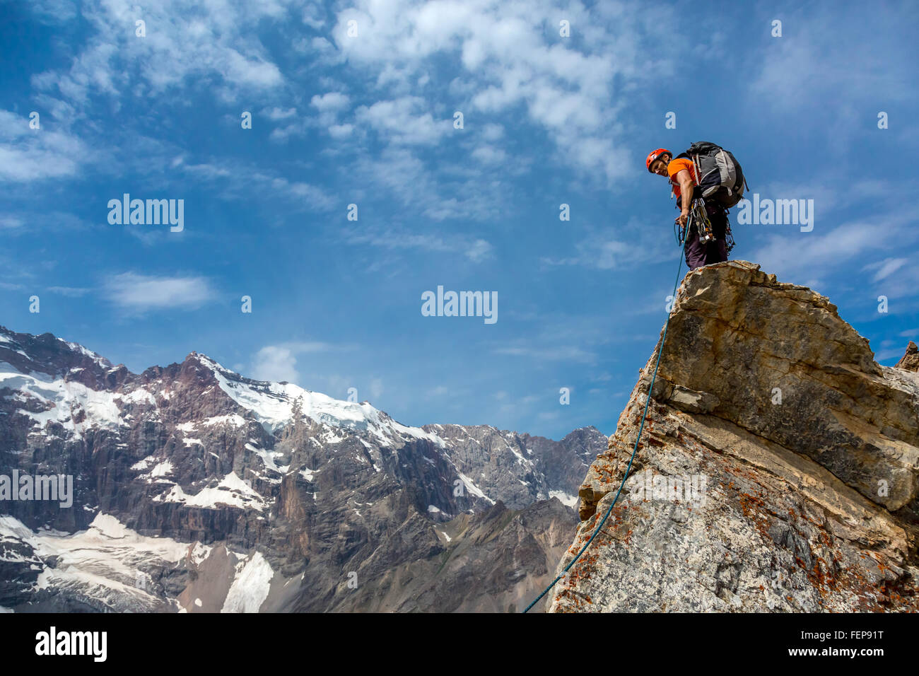 Mountain climber on top Stock Photo - Alamy