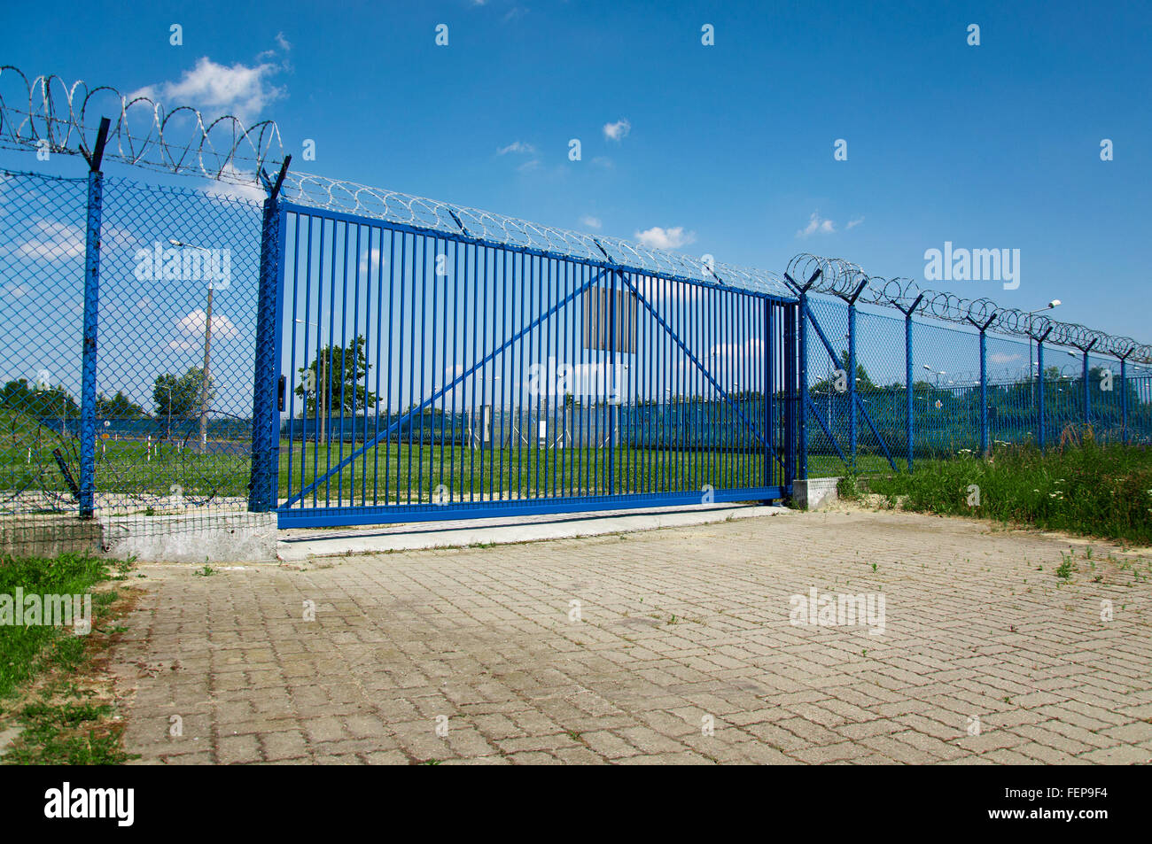 Barbed wire fence metal gate hi-res stock photography and images - Alamy