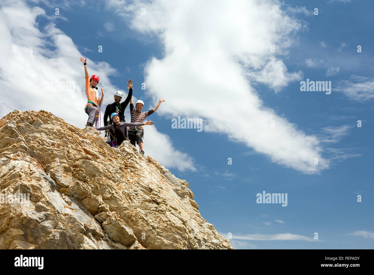 Silhouette people climbers climb top hi-res stock photography and ...
