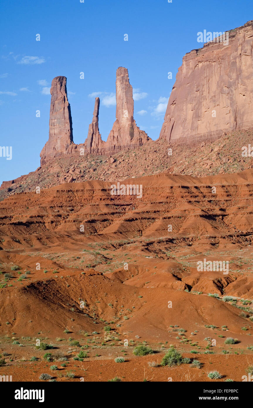 Eroded rock formation Three Sisters in the Monument Valley Navajo ...