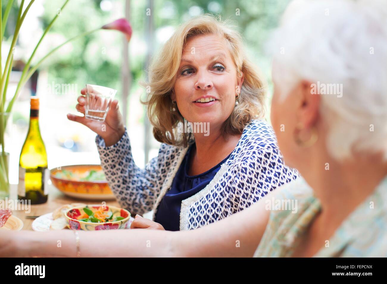 Two women drinking having lunch hi-res stock photography and images - Alamy