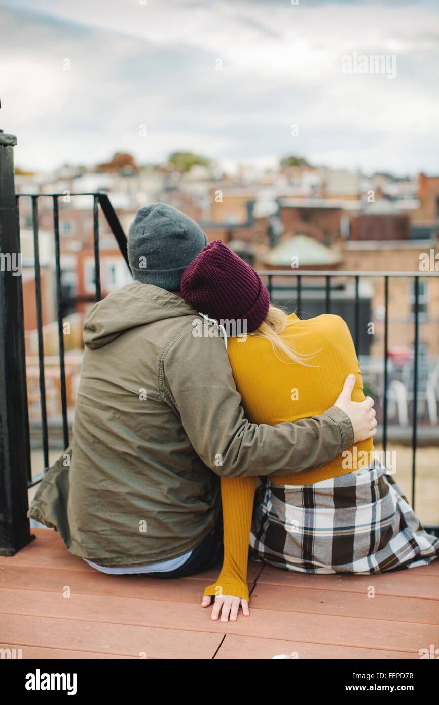 Man sitting rooftop terrace hi-res stock photography and images - Alamy