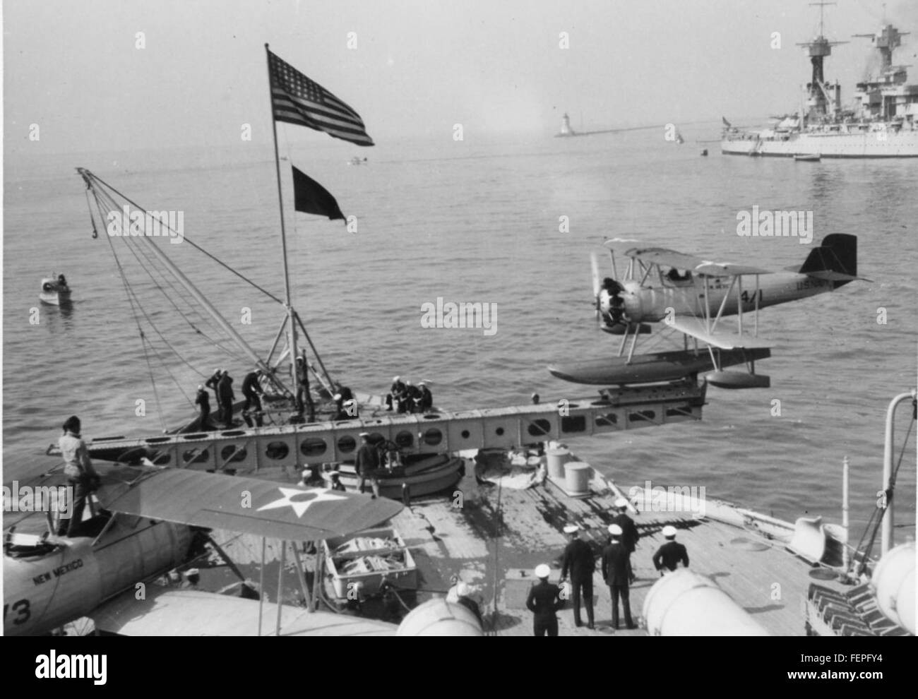 The Vought O2U-1, a scout observation biplane, is launched from the ...