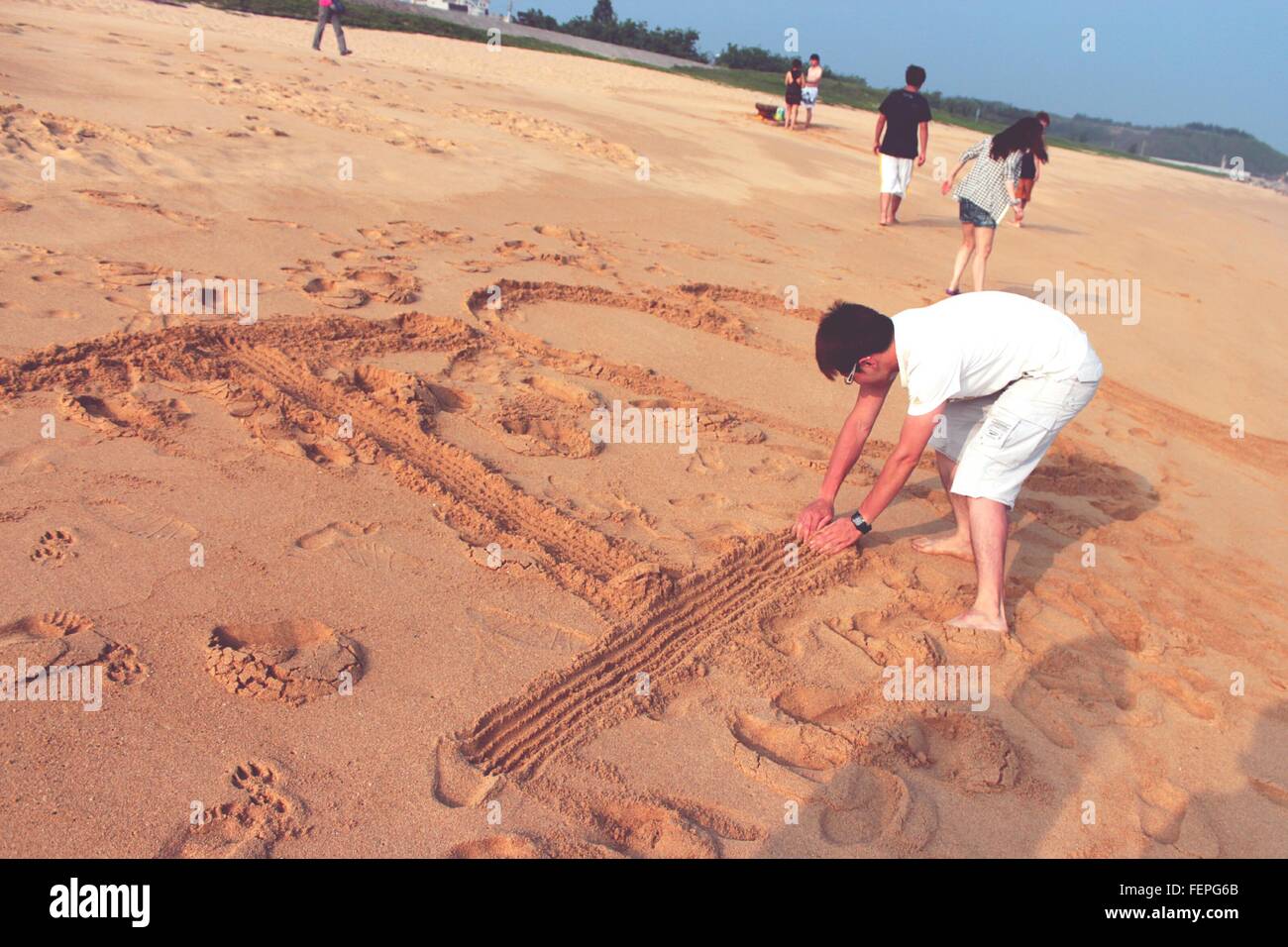Writing in sand hi-res stock photography and images - Alamy