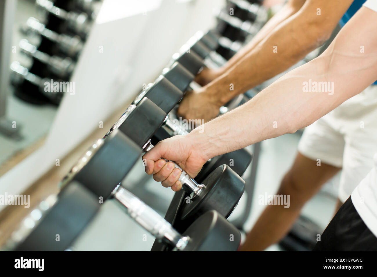 Dumbbell in the gym Stock Photo - Alamy