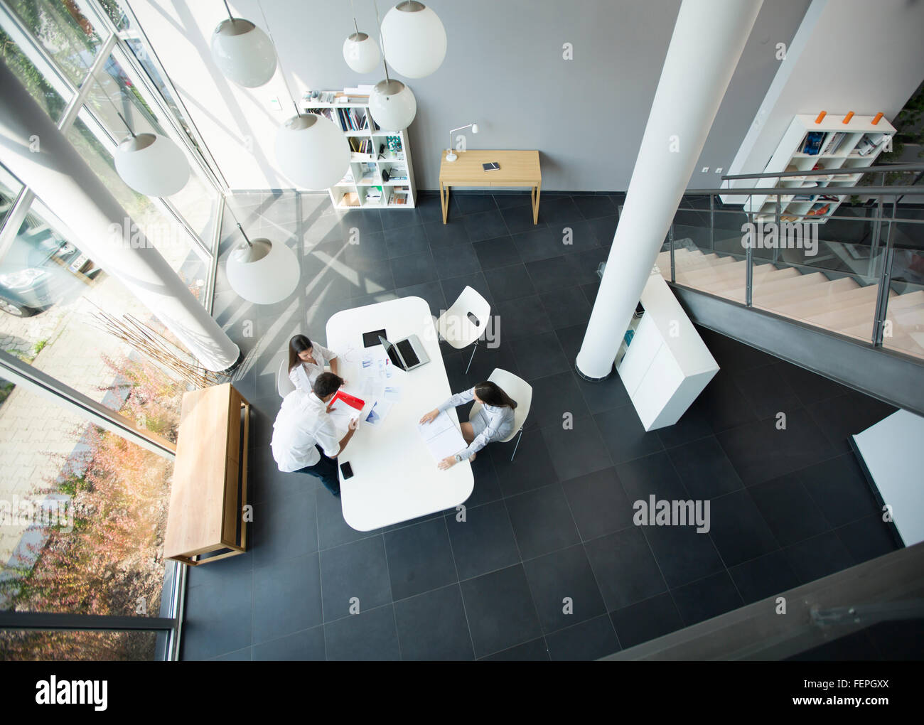 Teamwork in the office Stock Photo - Alamy