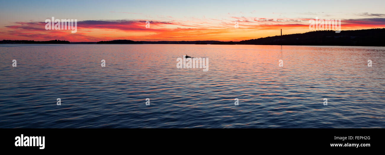 Calm sunset and clouds over lake Stock Photo - Alamy
