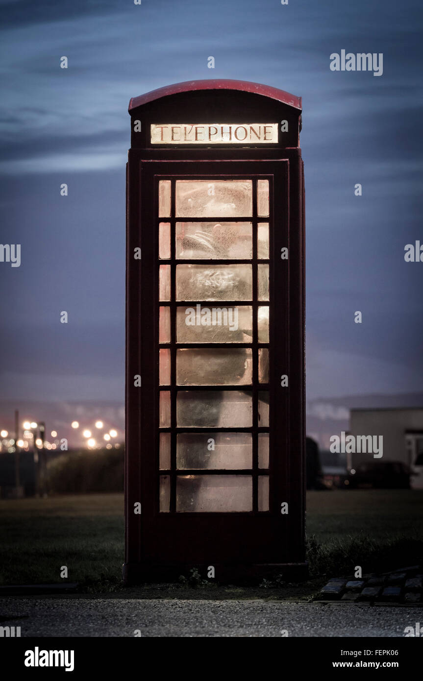 Man inside telephone box hi-res stock photography and images - Alamy