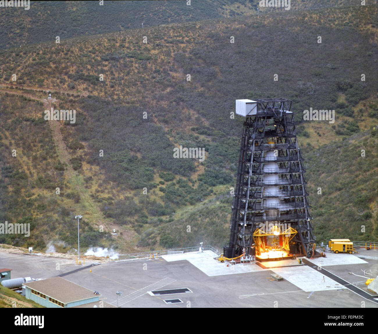 The image showcases a static test of the Atlas 1B missile, a key ...