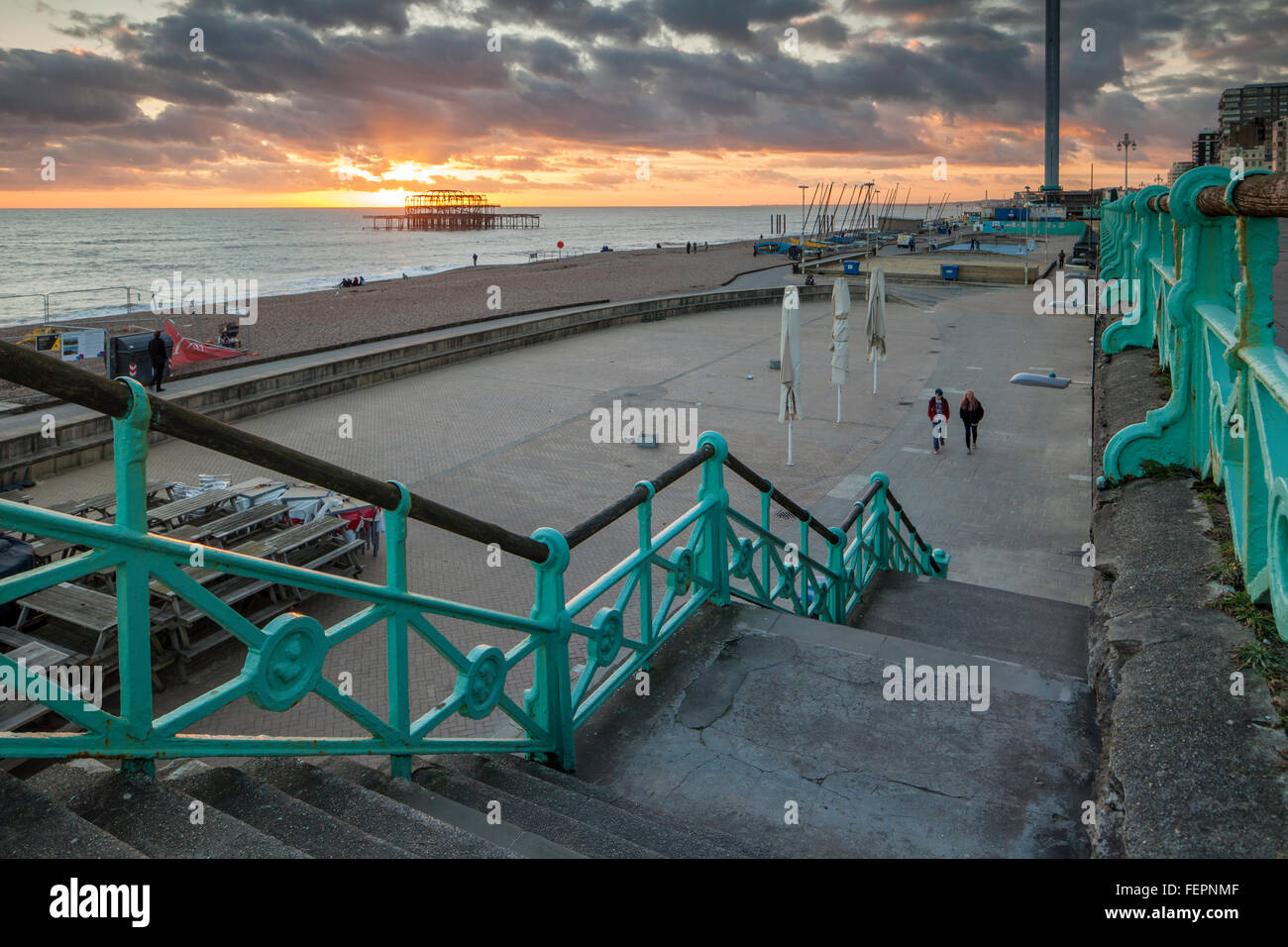 Sunset on Brighton seafront, East Sussex, England. West Pier ruins in ...