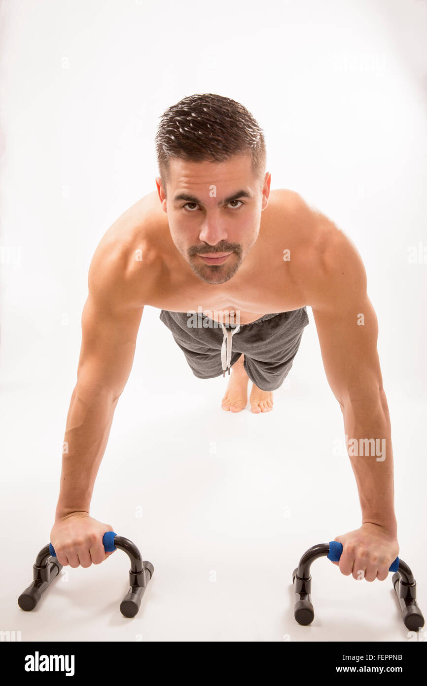 Strong beautiful man doing sport Stock Photo - Alamy