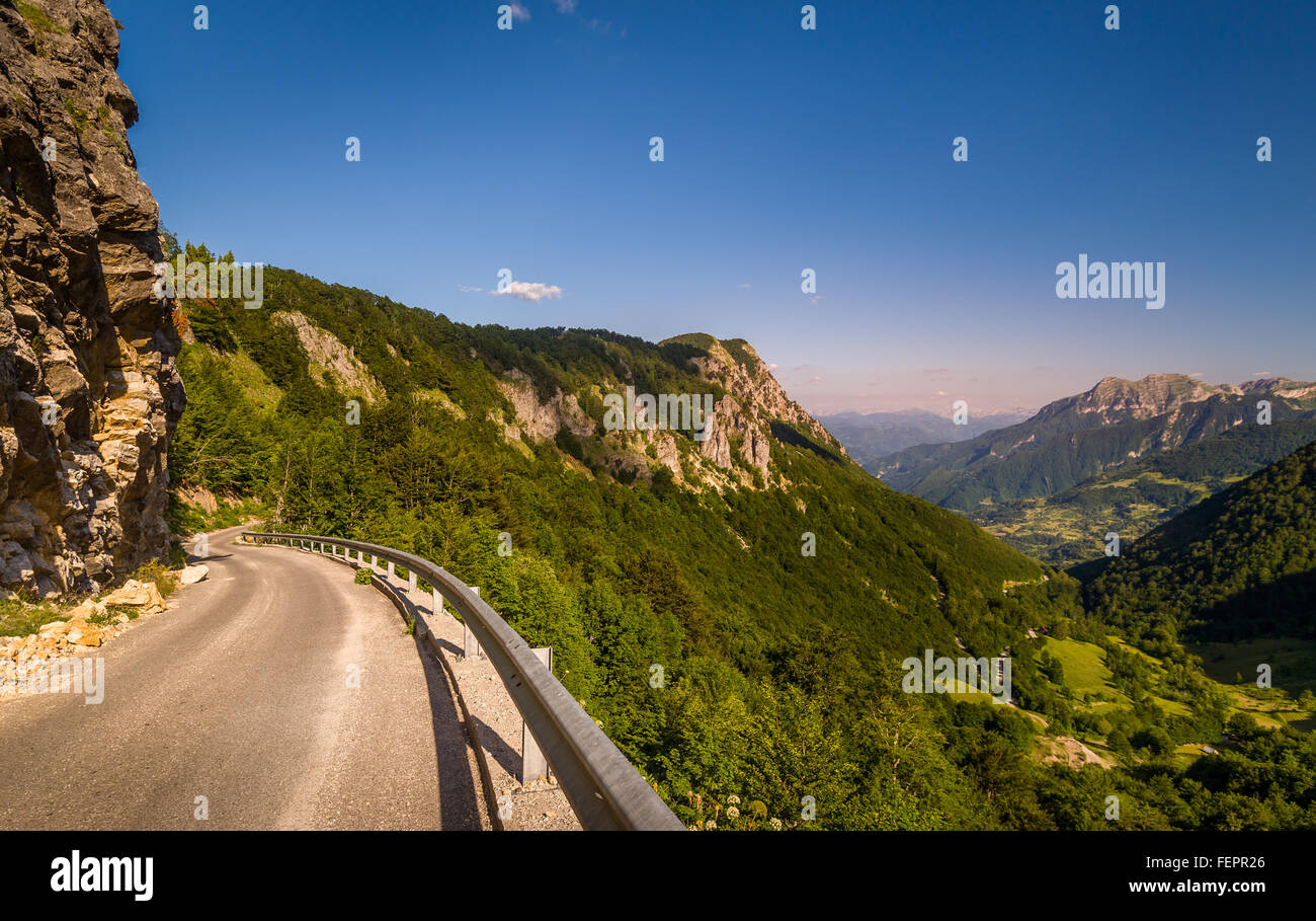 Curved mountain road Stock Photo - Alamy