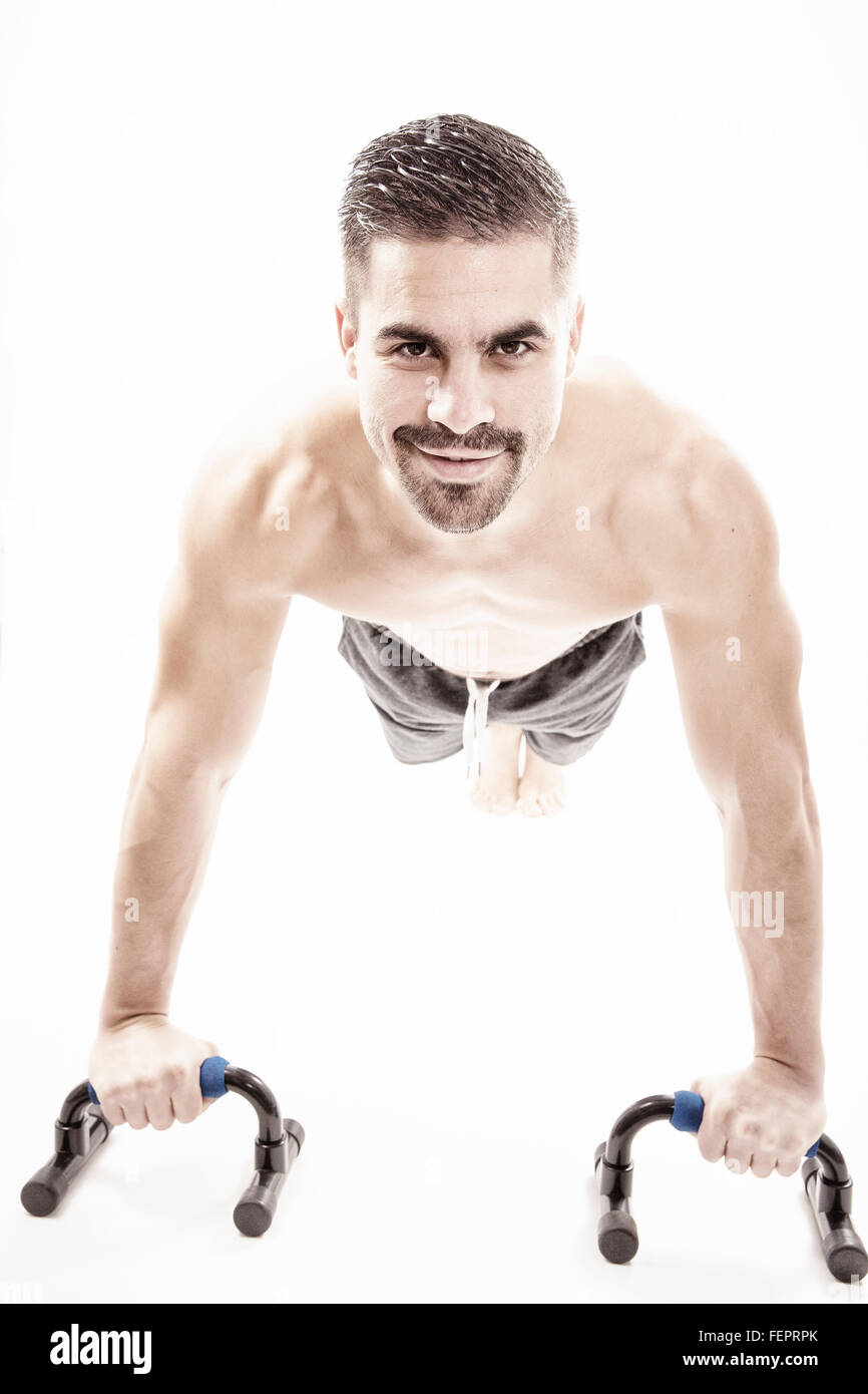 Strong beautiful man doing sport Stock Photo - Alamy