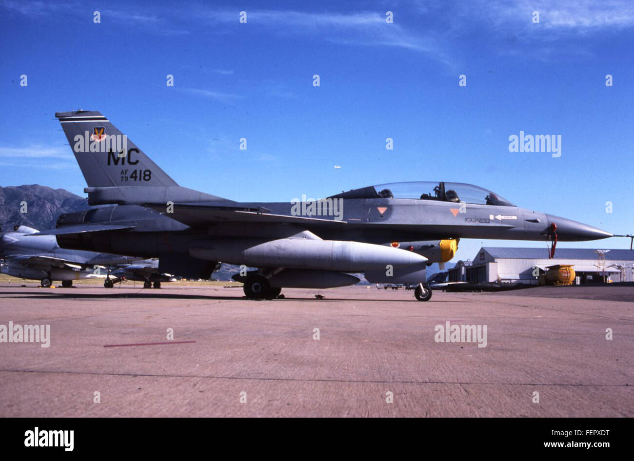 The General Dynamics F-16B Falcon (79-0418) of the 62nd Tactical ...